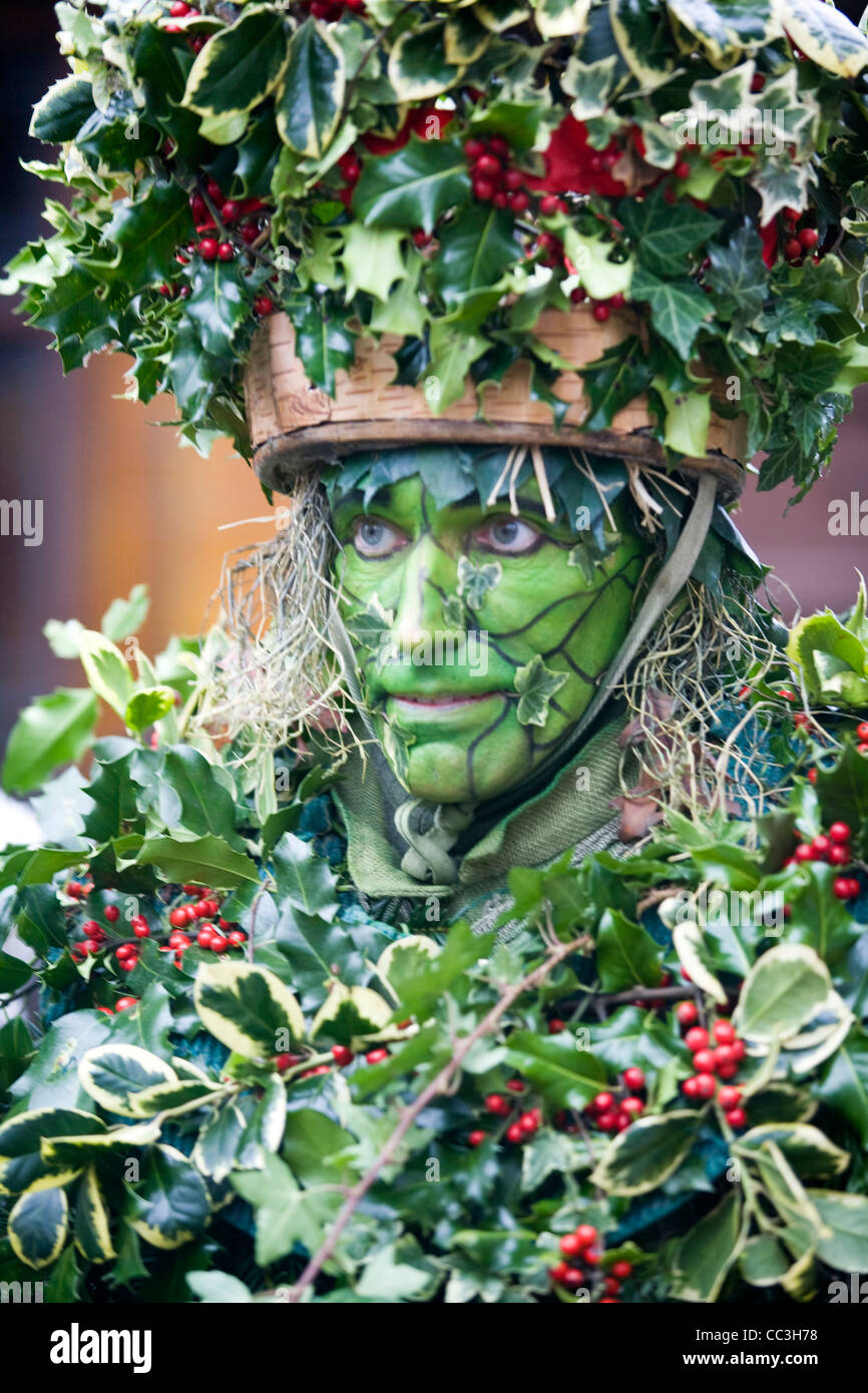 A performer dressed as the Green Man (also known as the Holly Man) acts ...