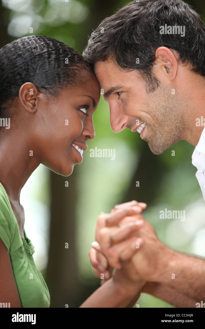 Couple looking into each other's eyes Stock Photo - Alamy
