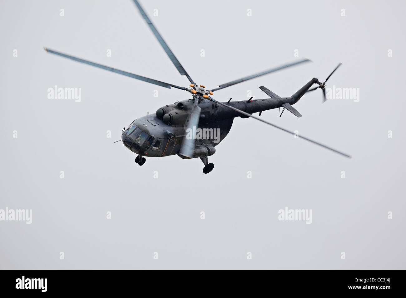 Army chopper Mi-17 makes a fly-by during a training flight above the ...