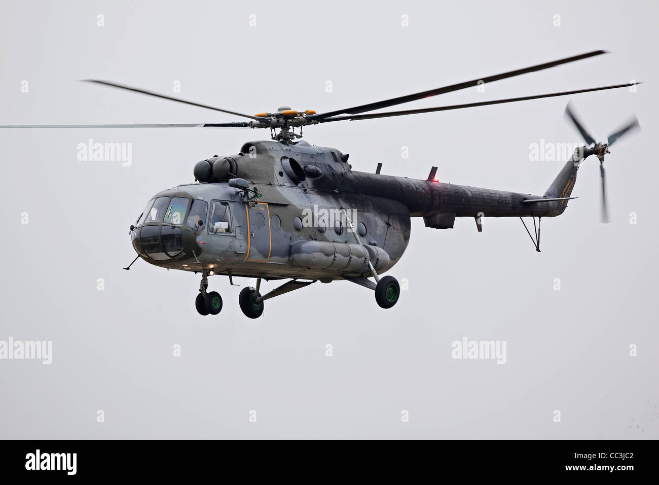 Army chopper Mi-17 makes a fly-by during a training flight above the ...