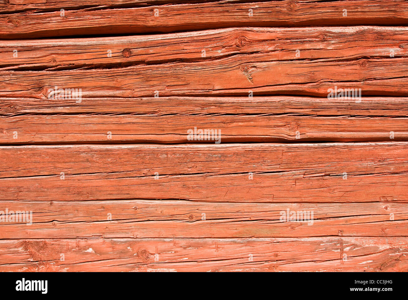 Red log wall Stock Photo - Alamy