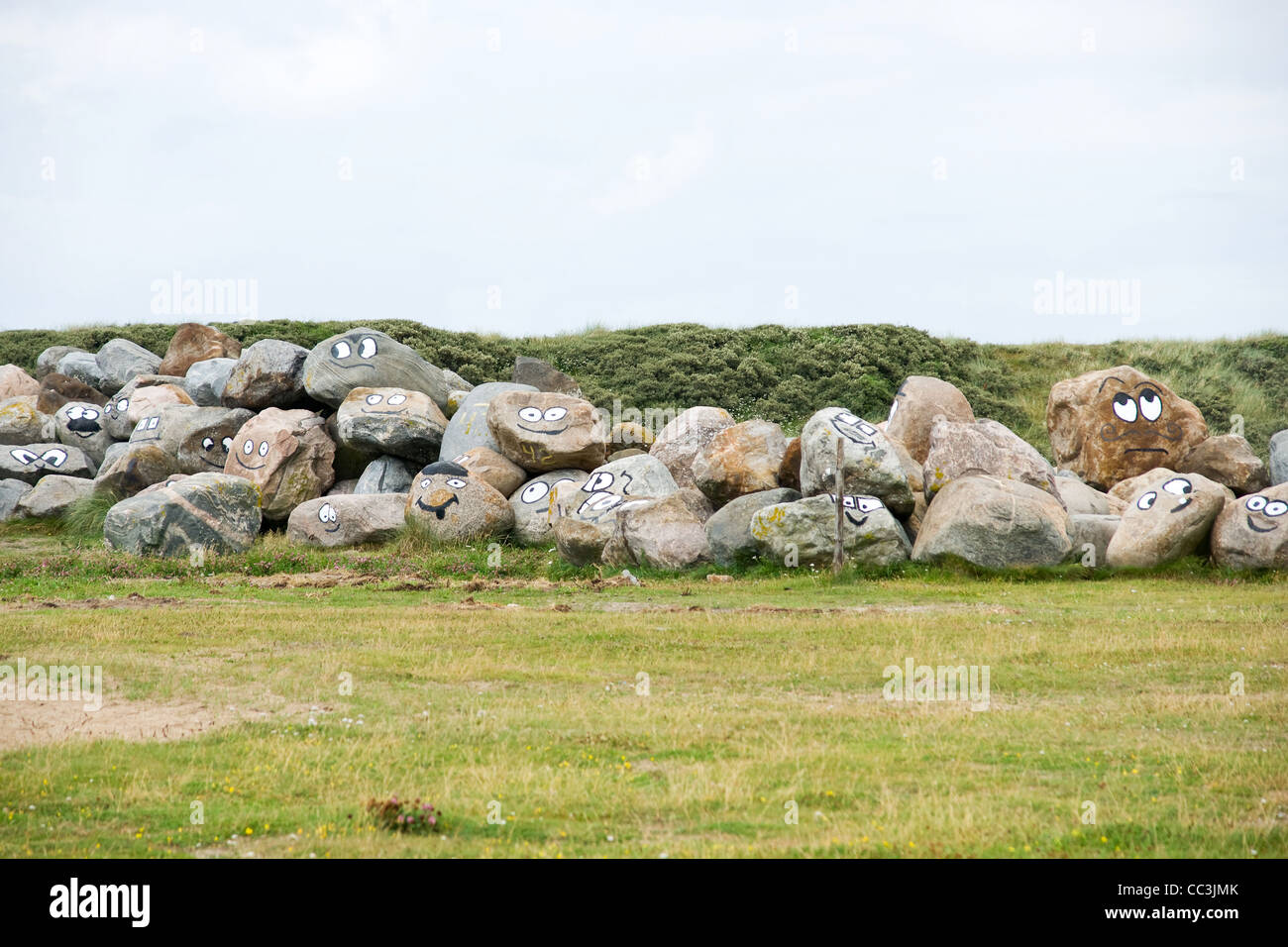 Rocks with painted smiling faces Stock Photo - Alamy