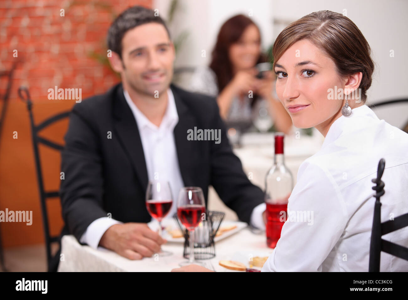 Couple having meal in restaurant Stock Photo - Alamy