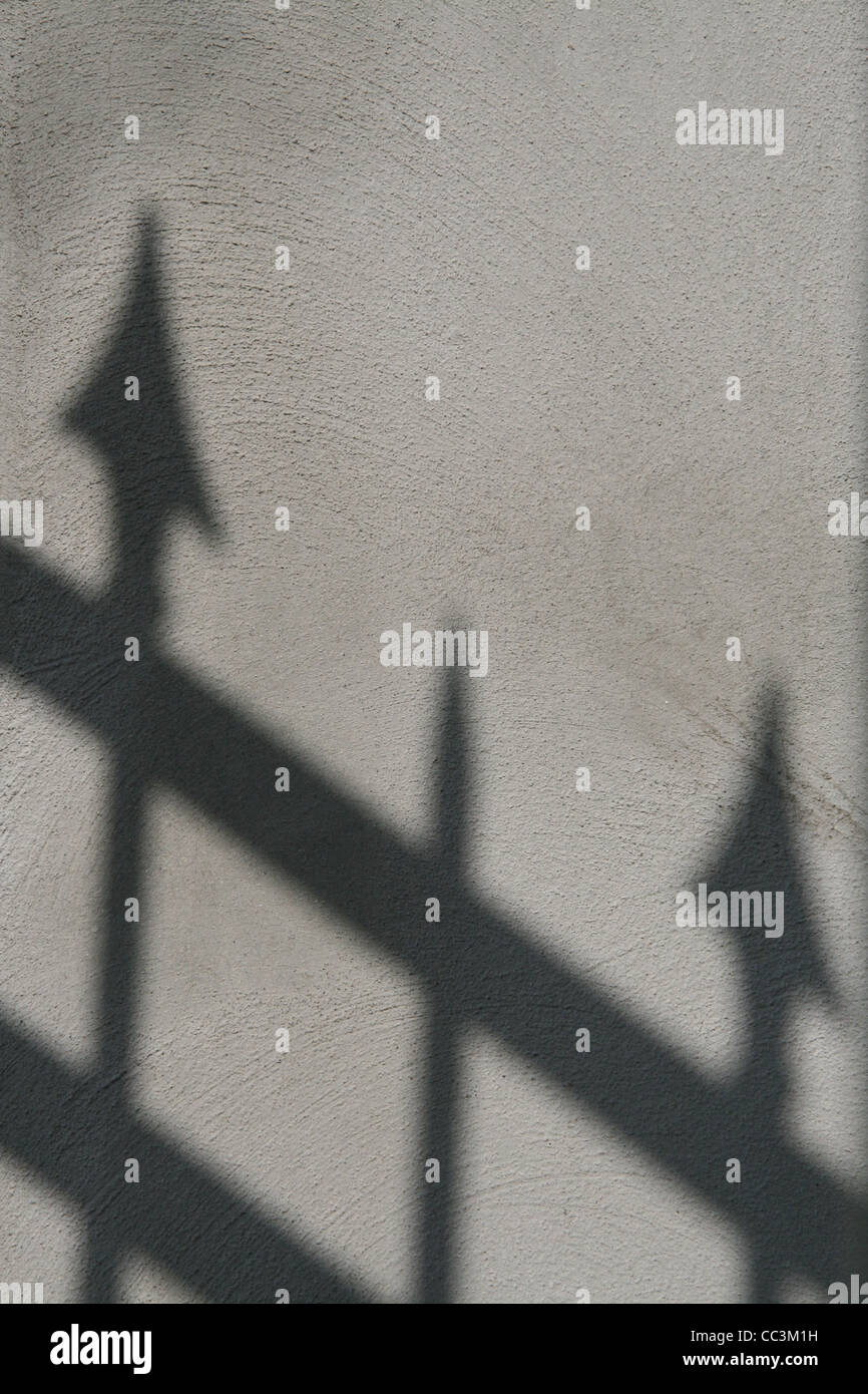 metal fence shadow on wall Stock Photo - Alamy