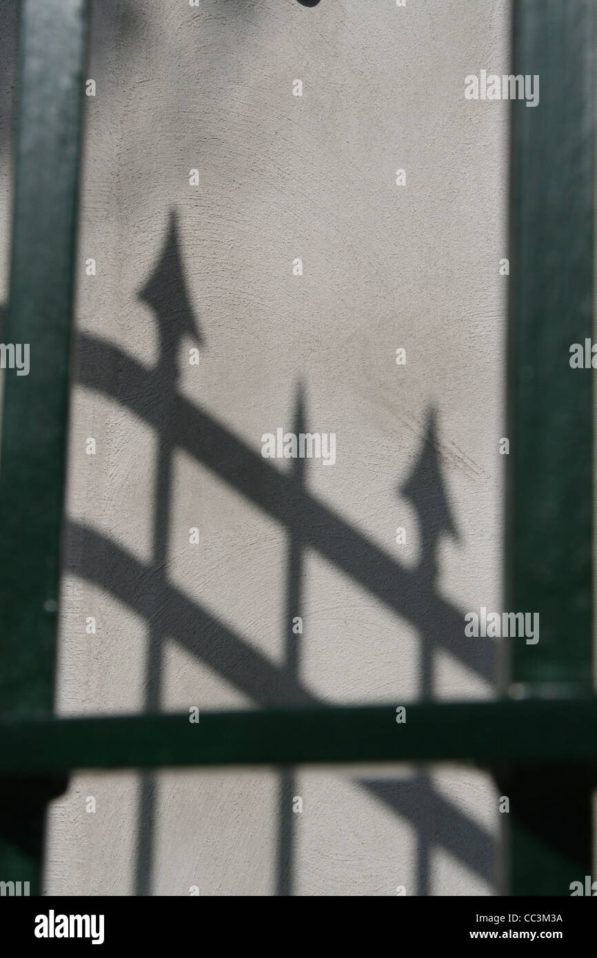 metal fence shadow on wall Stock Photo - Alamy
