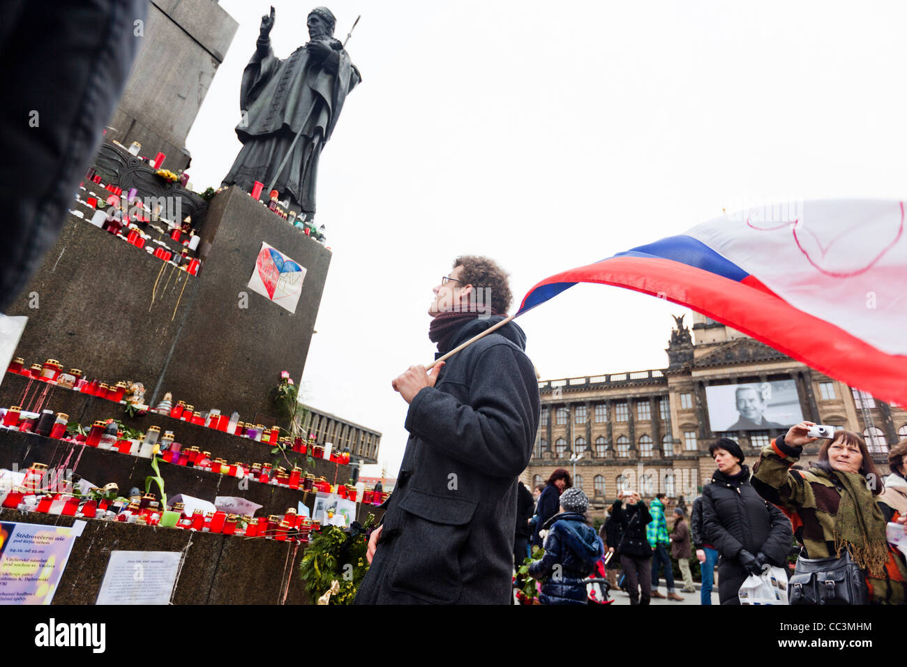 Student Adam Rames walks with Czech national flag painted with symbolic ...