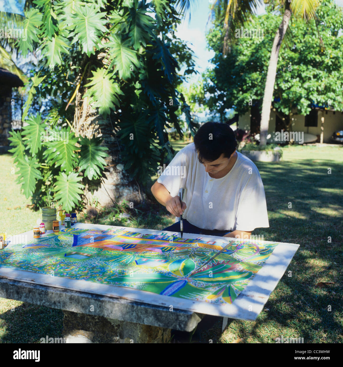 Local artist, naive painter at work, Seychelles Stock Photo - Alamy