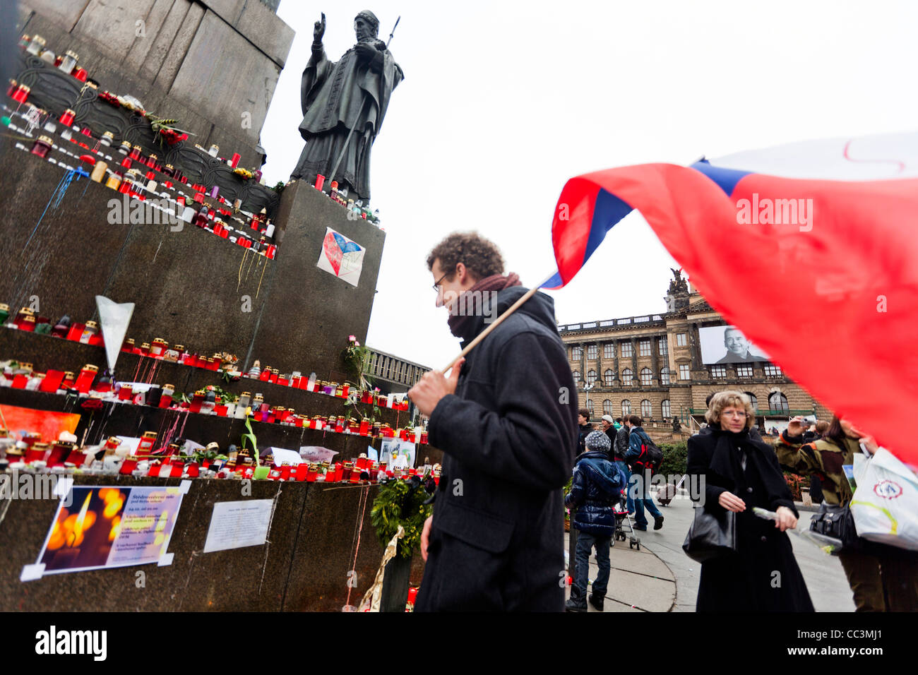 Student Adam Rames walks with Czech national flag painted with symbolic ...