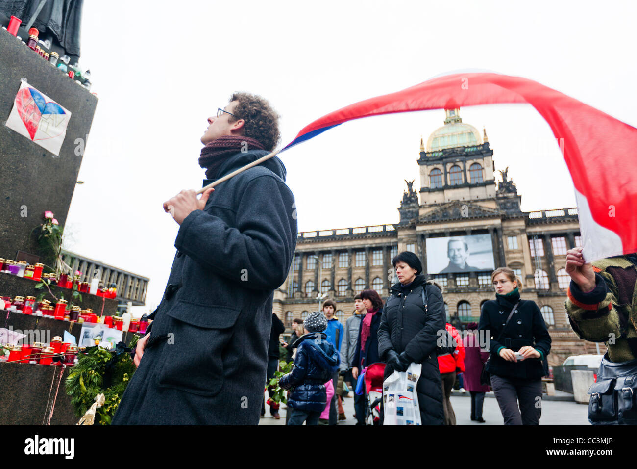 Student Adam Rames walks with Czech national flag painted with symbolic ...