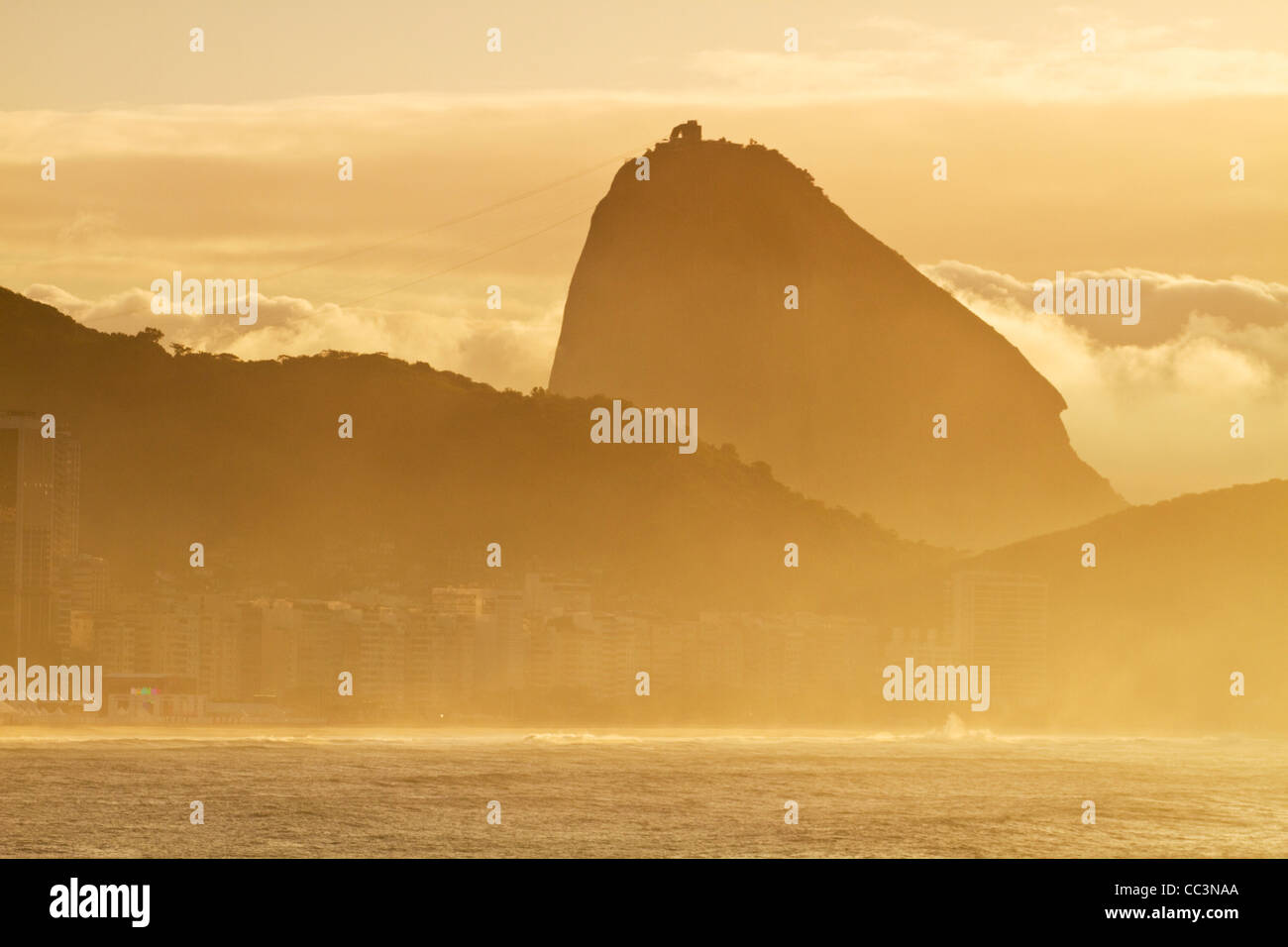 Brazil, Rio De Janeiro, View of Sugar Loaf at sunrise from Copacabana ...