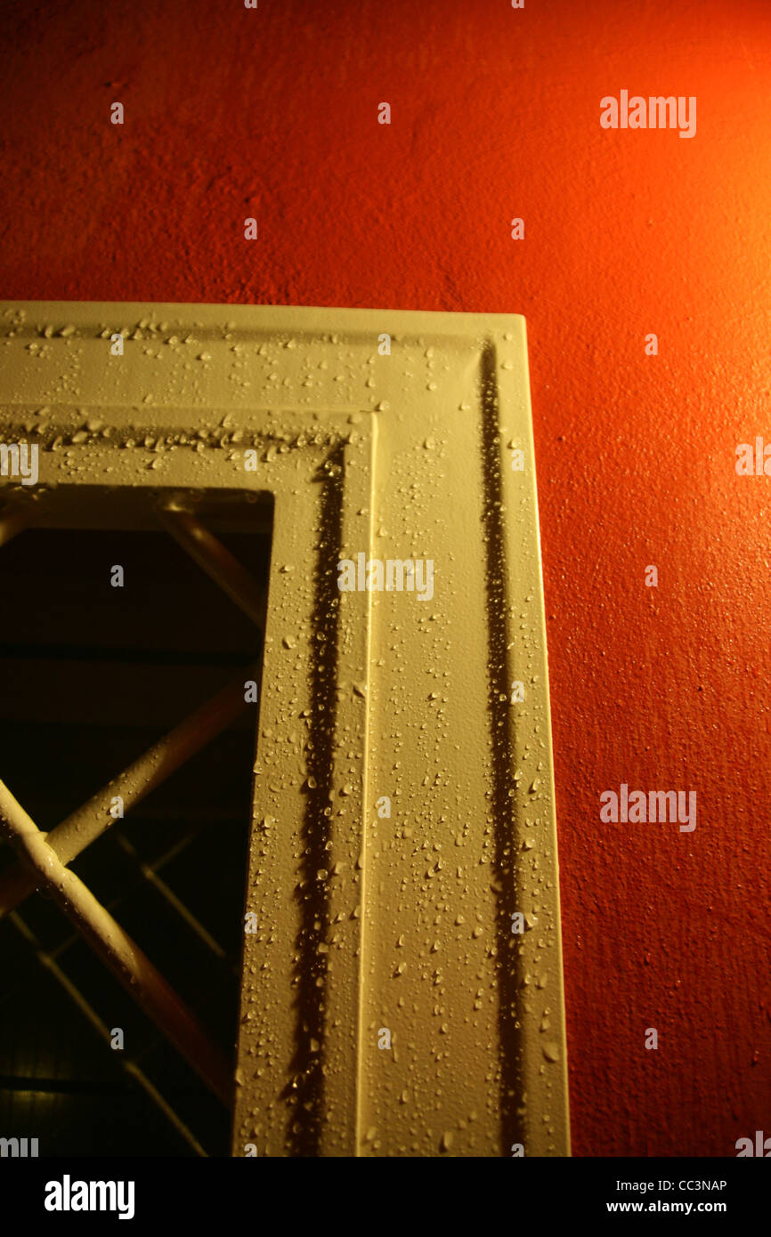 rain drops on metal door frame on house at night Stock Photo - Alamy