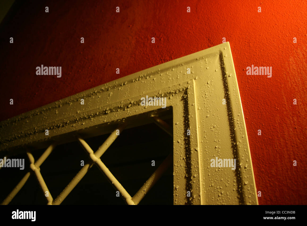 rain drops on metal door frame on house at night Stock Photo - Alamy