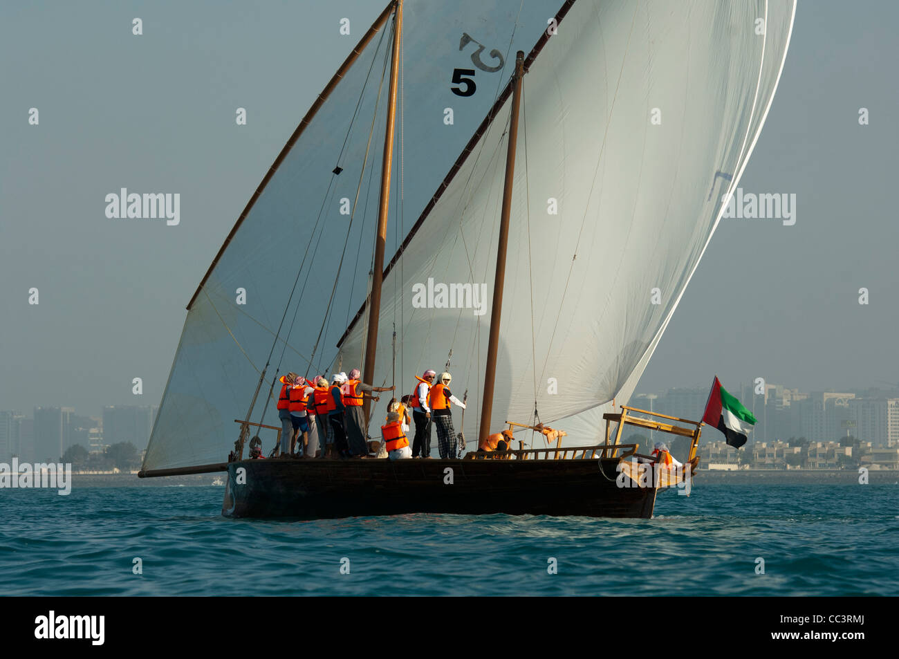 A traditional sailing Dhow Racing in Abu Dhabi, United Arab Emirates ...