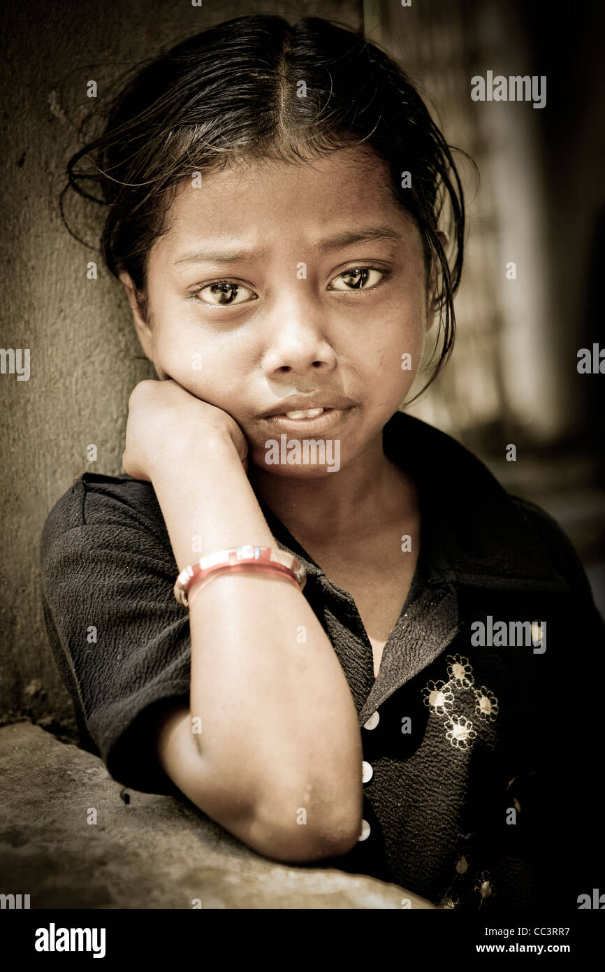 Portrait of a young Saora girl at the hot springs shrine at Taptapani ...