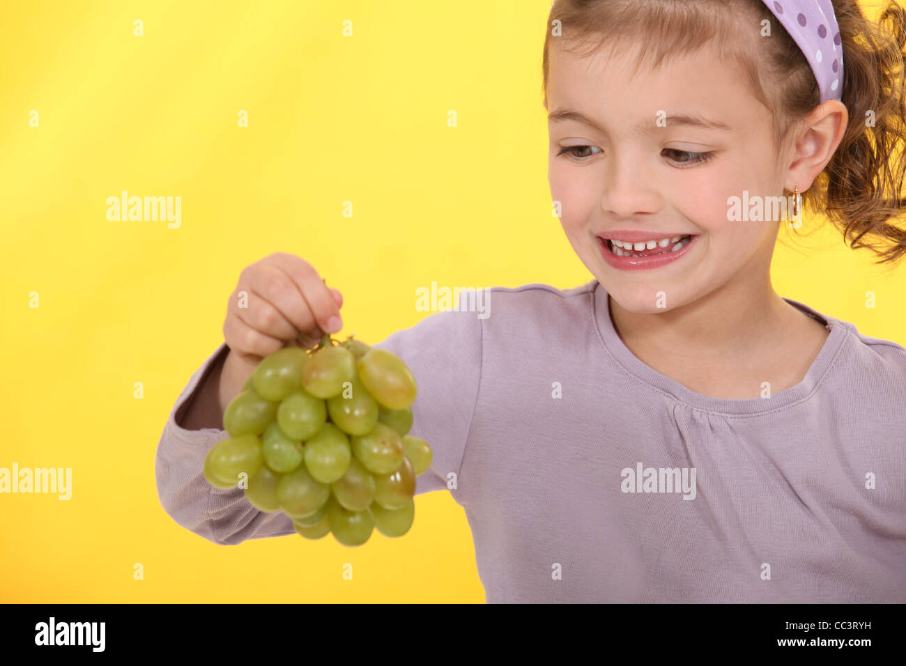 Little girl with grapes Stock Photo - Alamy Little girl with grapes Stock Photo - Alamy