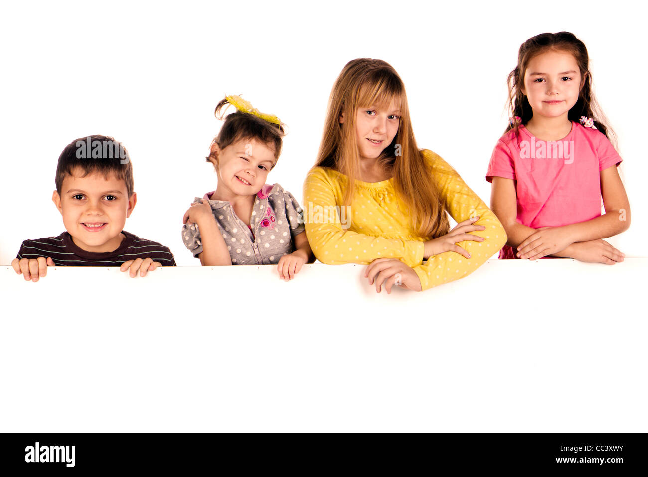 Laughing small kids on a white background Stock Photo - Alamy