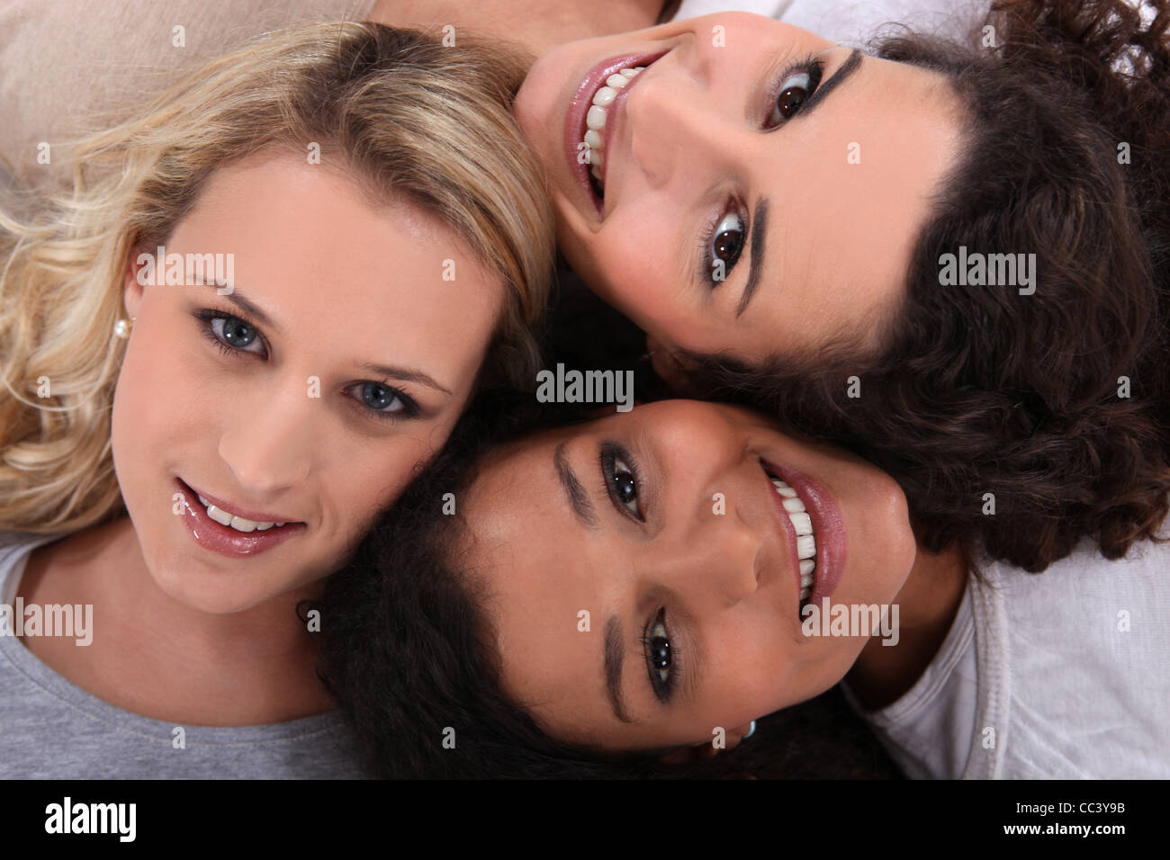 Three female friends Stock Photo - Alamy