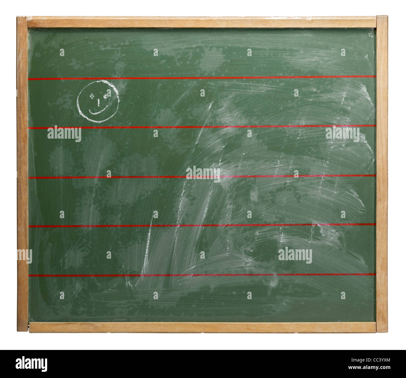 old used greenboard with crayon-painted smiley and red lines on it ...