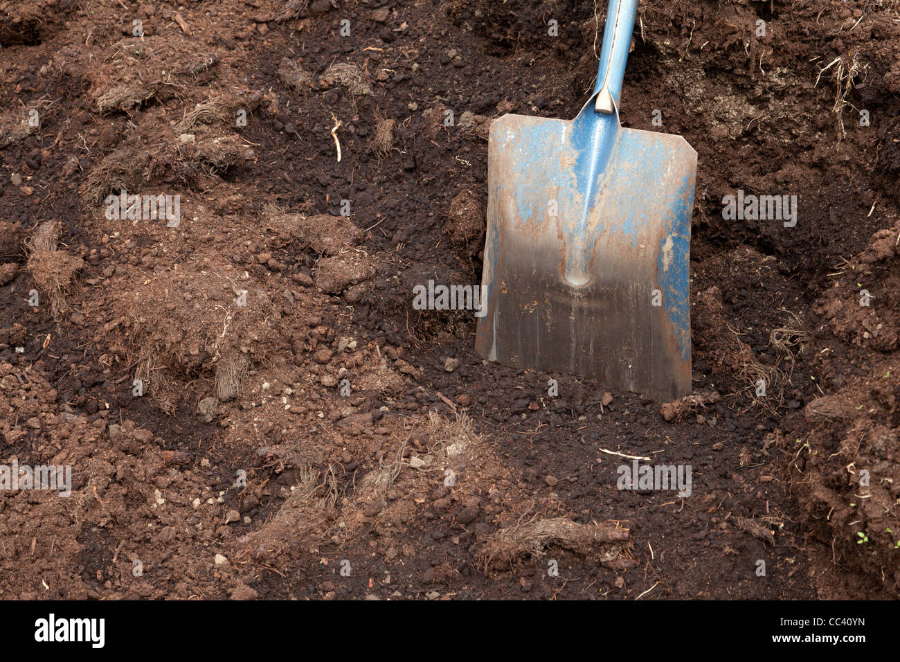 Spade and soil Stock Photo - Alamy