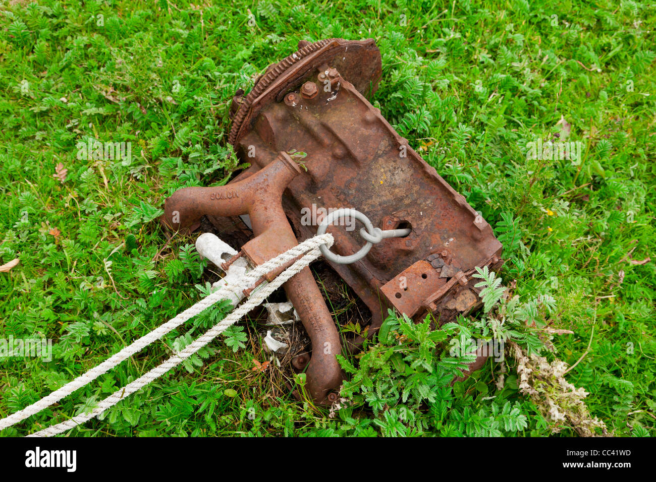 Old rusted engine used to tie up boats Stock Photo - Alamy