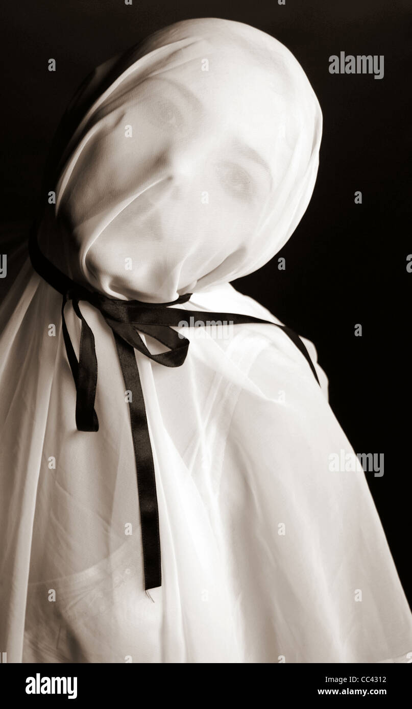 Woman with a netting on her face Stock Photo - Alamy