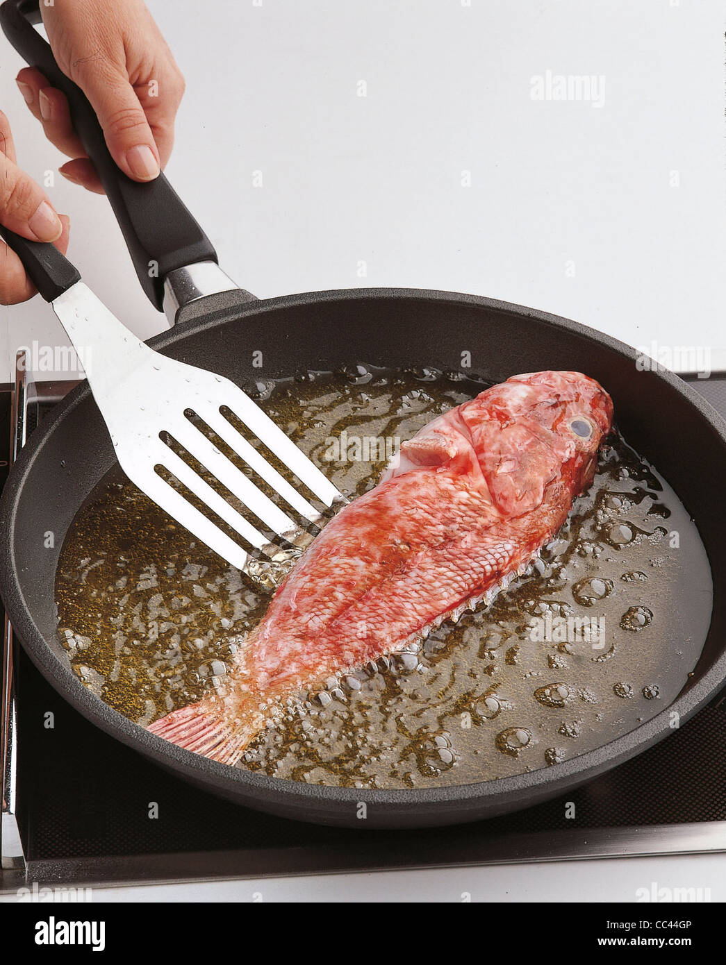 Kitchen: Fried Fish (3 Stock Photo - Alamy