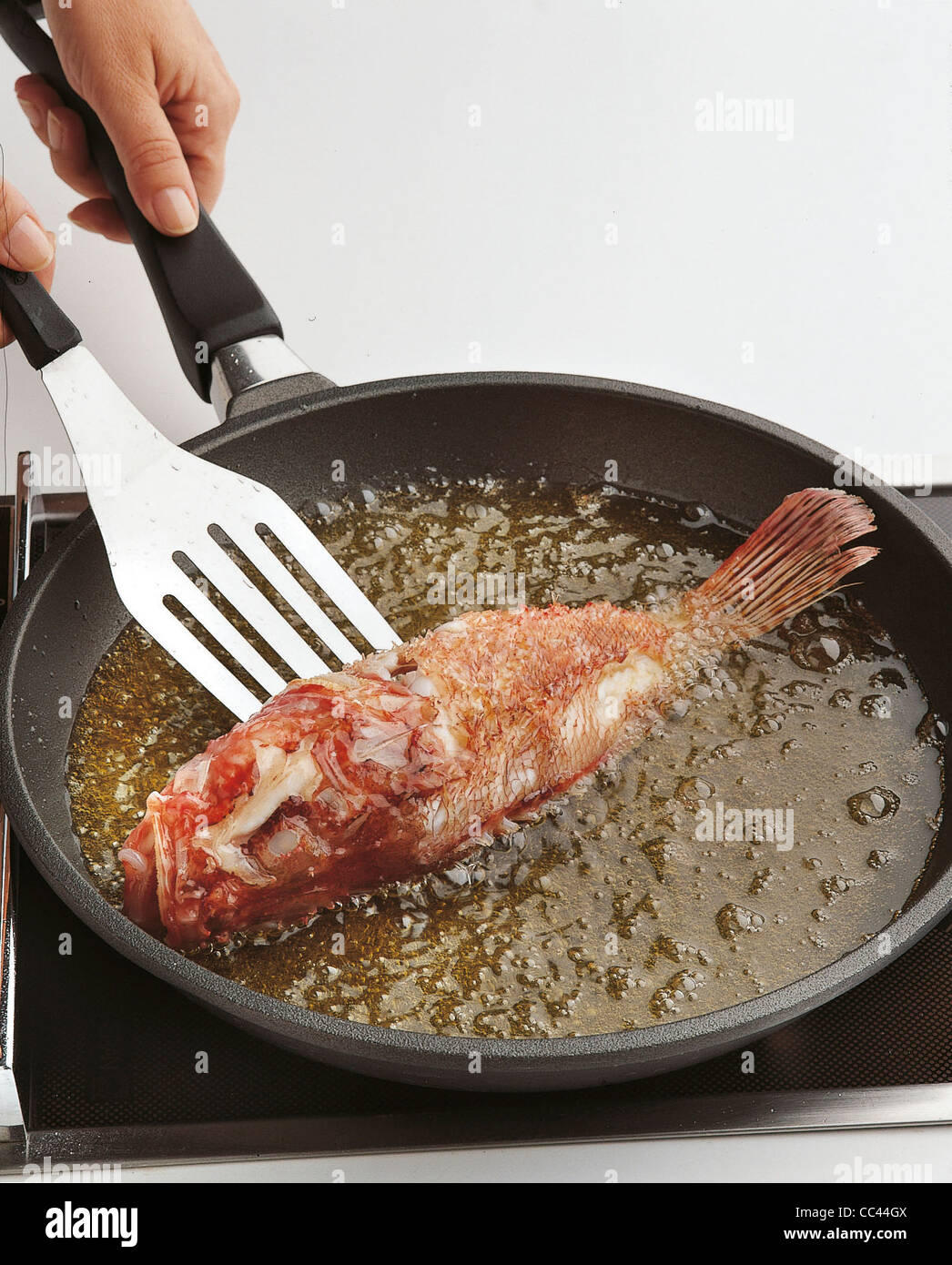 Kitchen: Fried Fish (4 Stock Photo - Alamy
