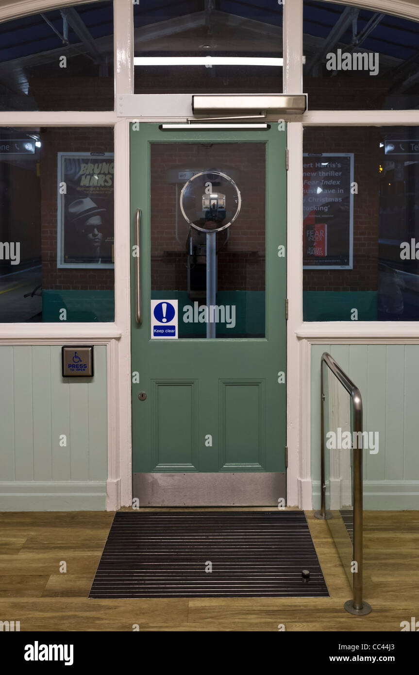 Station waiting room door with automatic opener and closer Stock Photo ...
