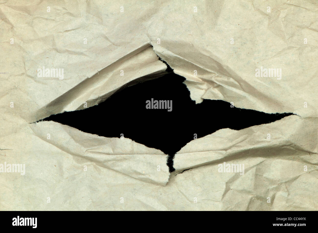 Old torn paper in the center Stock Photo - Alamy