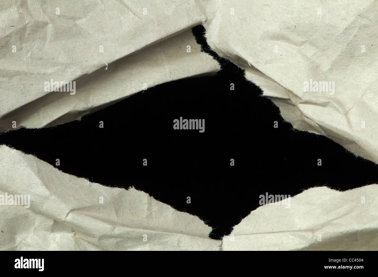 Old torn paper in the center Stock Photo - Alamy