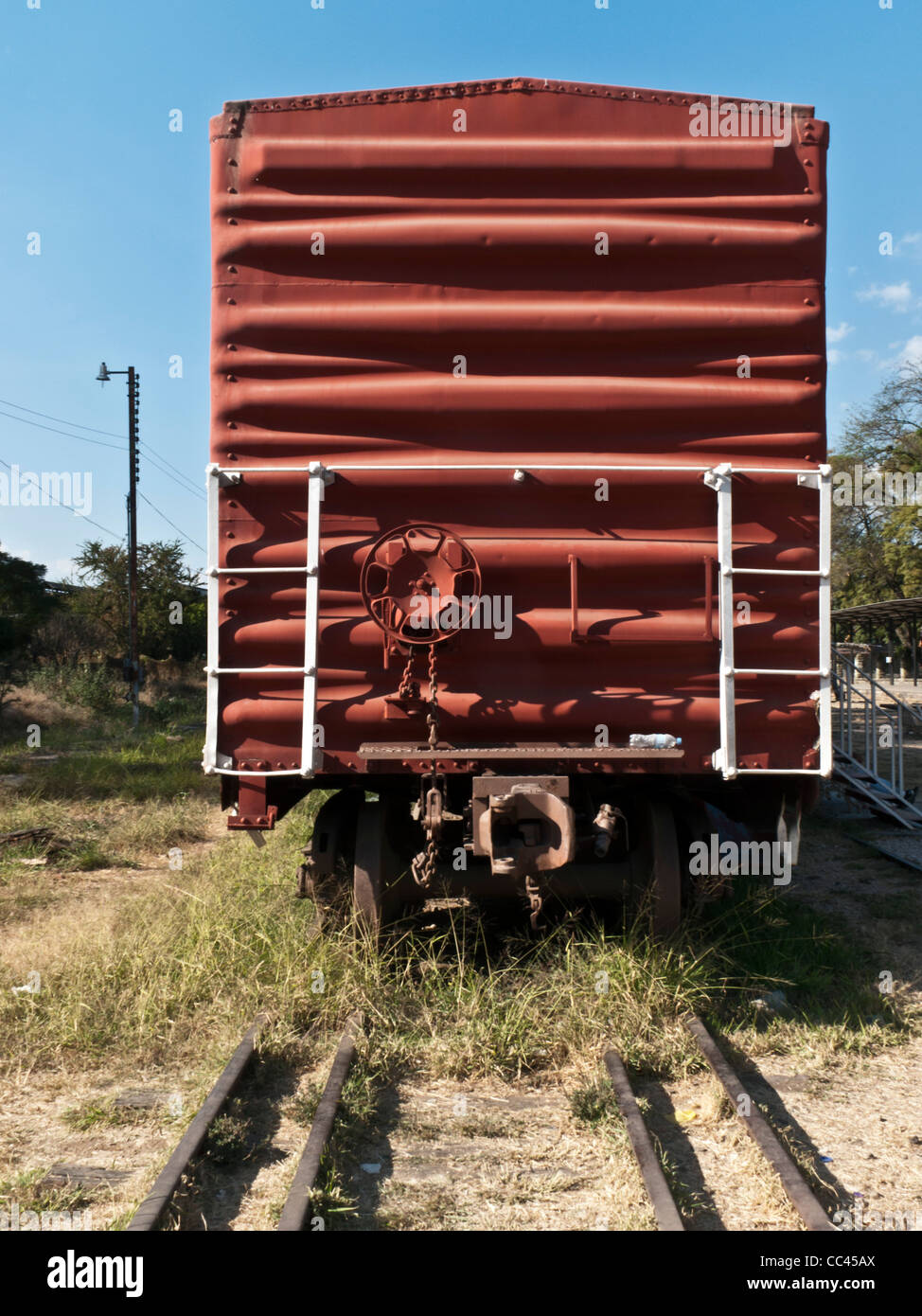 back end of old boxcar preserved for display on weed choked rails at ...
