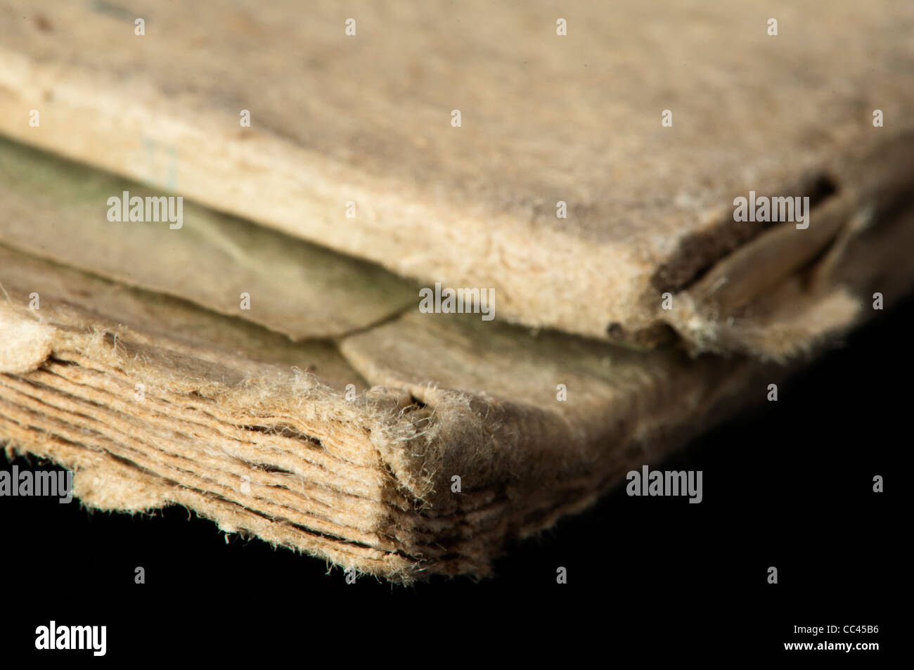 Old tattered book cover hi-res stock photography and images - Alamy