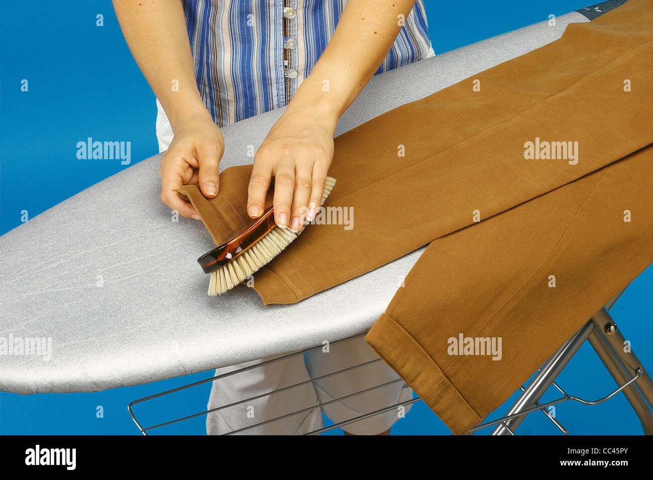 How to fold perfectly ironed trousers hi-res stock photography and ...