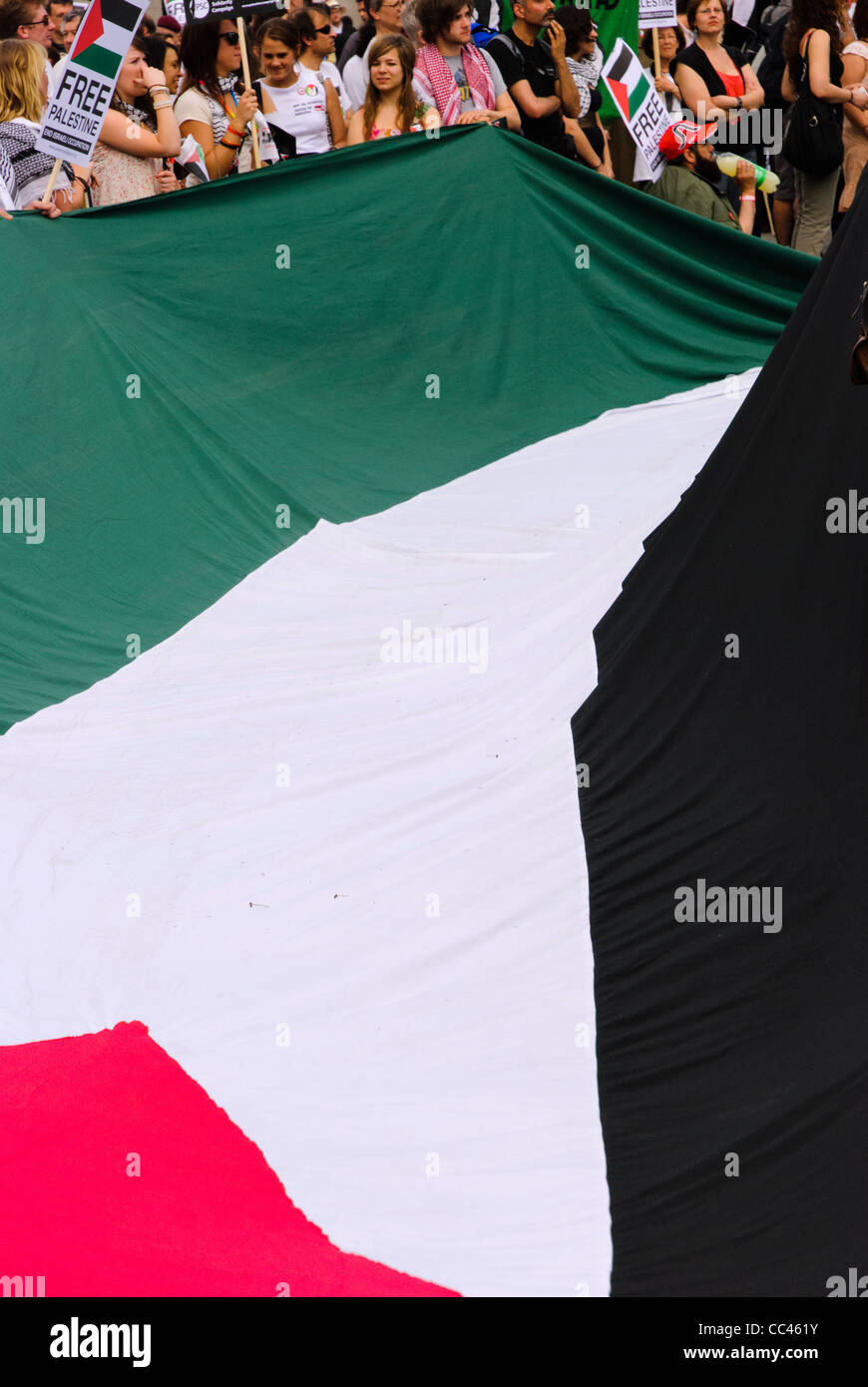 Palestinian flag during the march against the siege on Gaza in London ...
