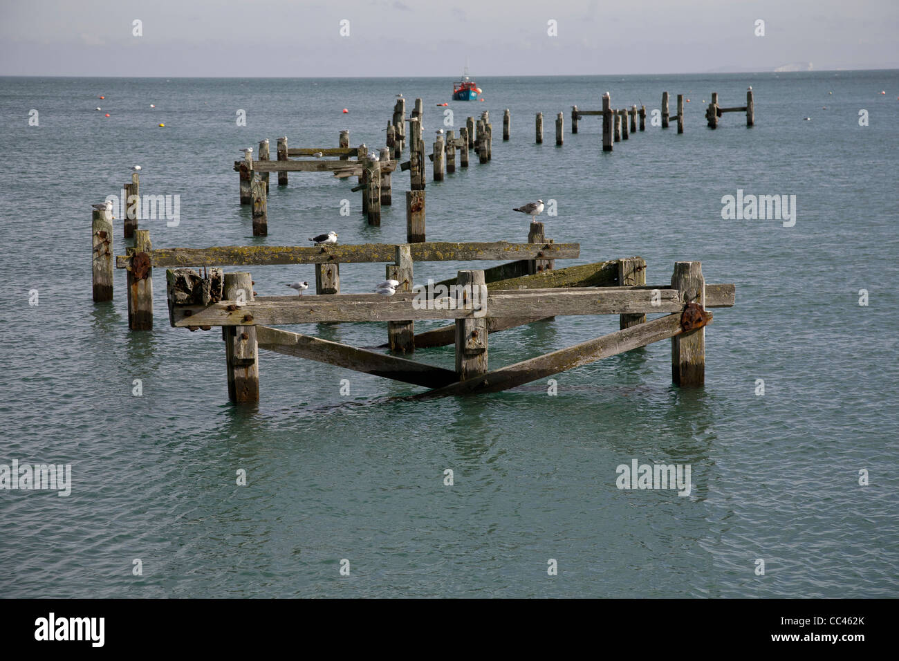 The rotting remains of the old pier at Swanage Dorset Stock Photo - Alamy
