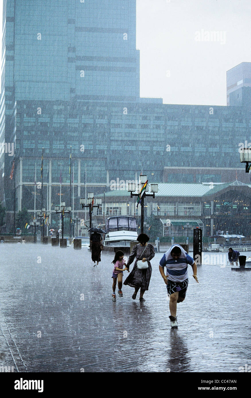 United States Of America Baltimore Maryland Pedestrians In The Rain ...