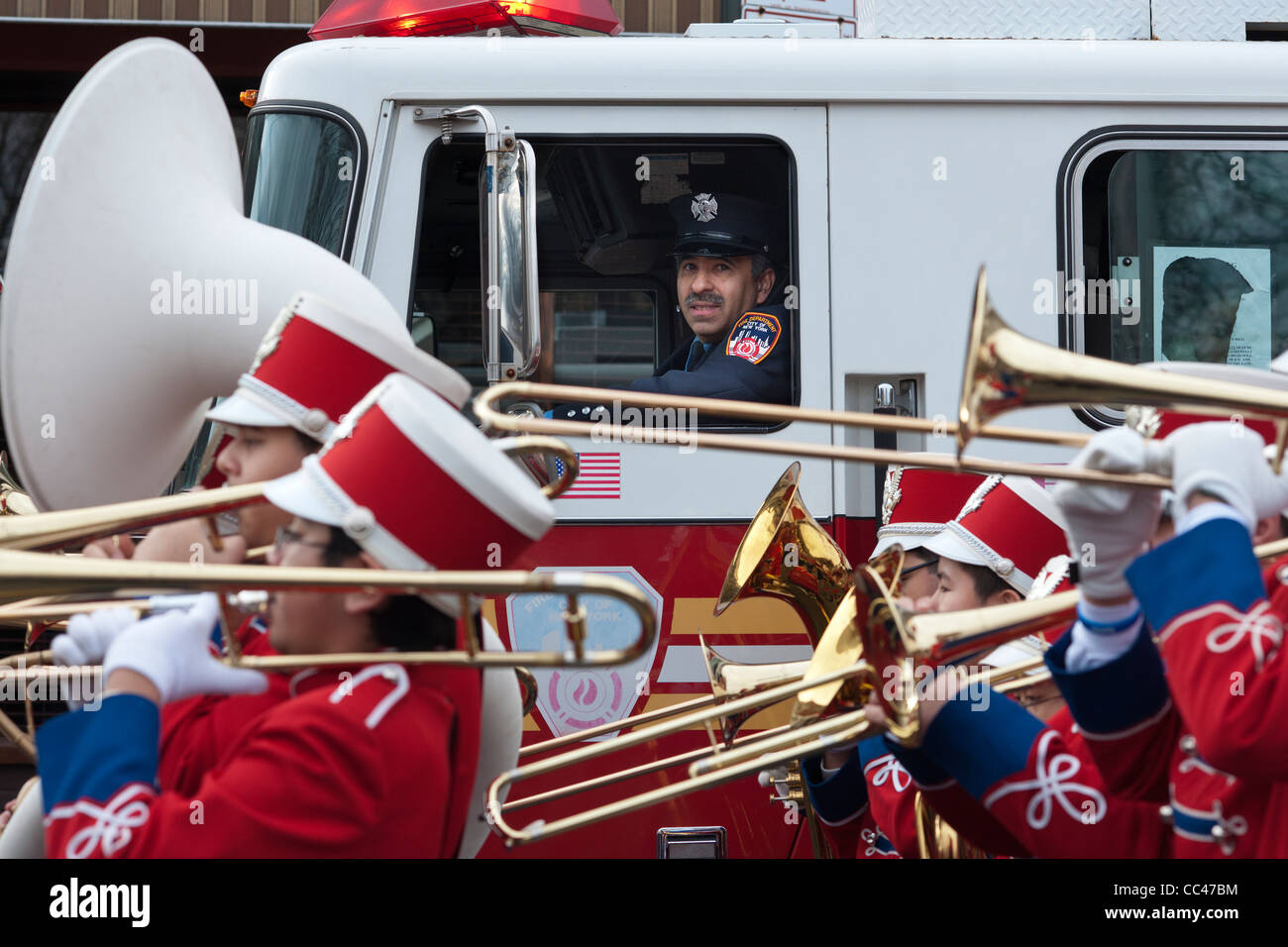 FDNY firefighter watches marching band in the annual Three Kings Day ...
