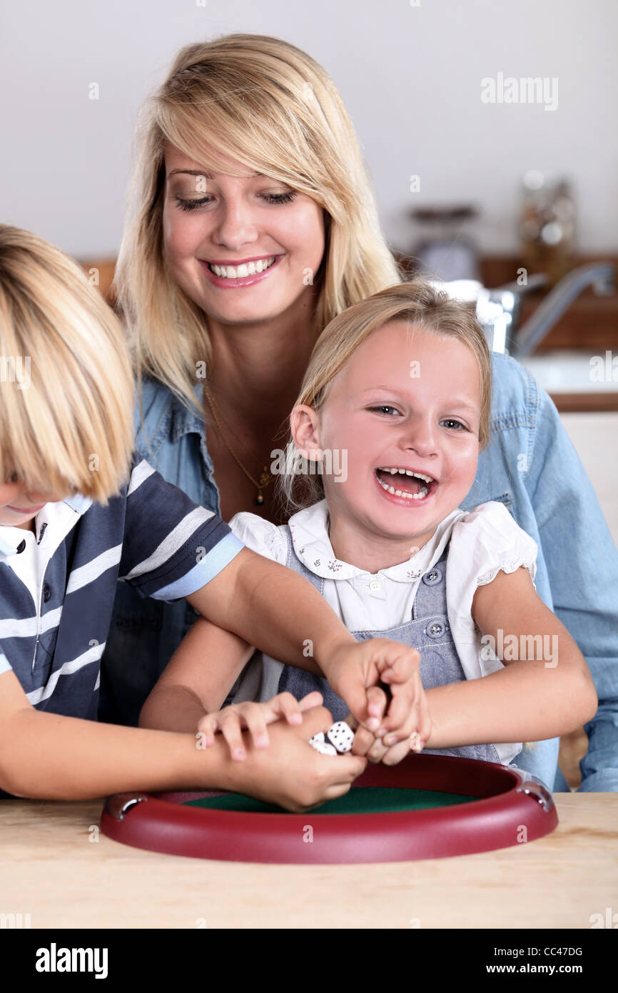 Children playing with dice Stock Photo - Alamy