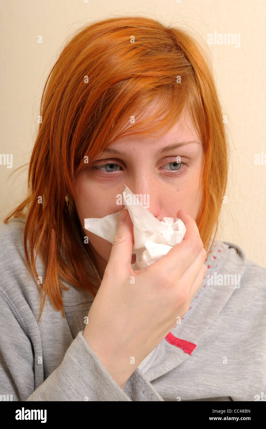 Young Women Unwell.Suffering with cold Stock Photo - Alamy