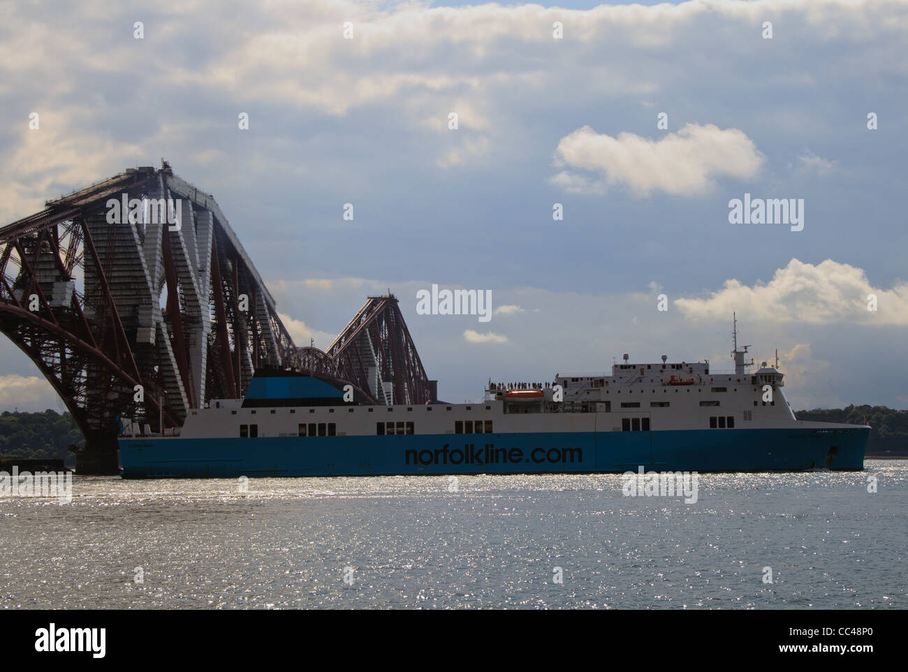ferry passing under forth rail bridge Stock Photo - Alamy