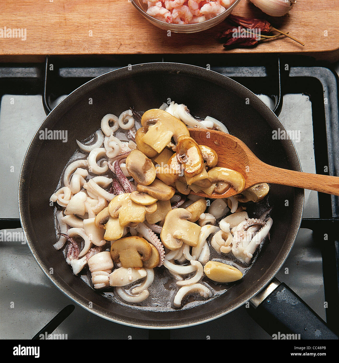 Kitchen squid mushrooms noodles hi-res stock photography and images - Alamy