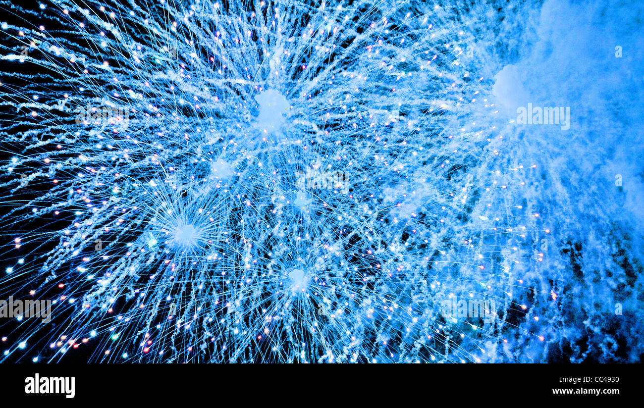 Blue fireworks in sky hi-res stock photography and images - Alamy