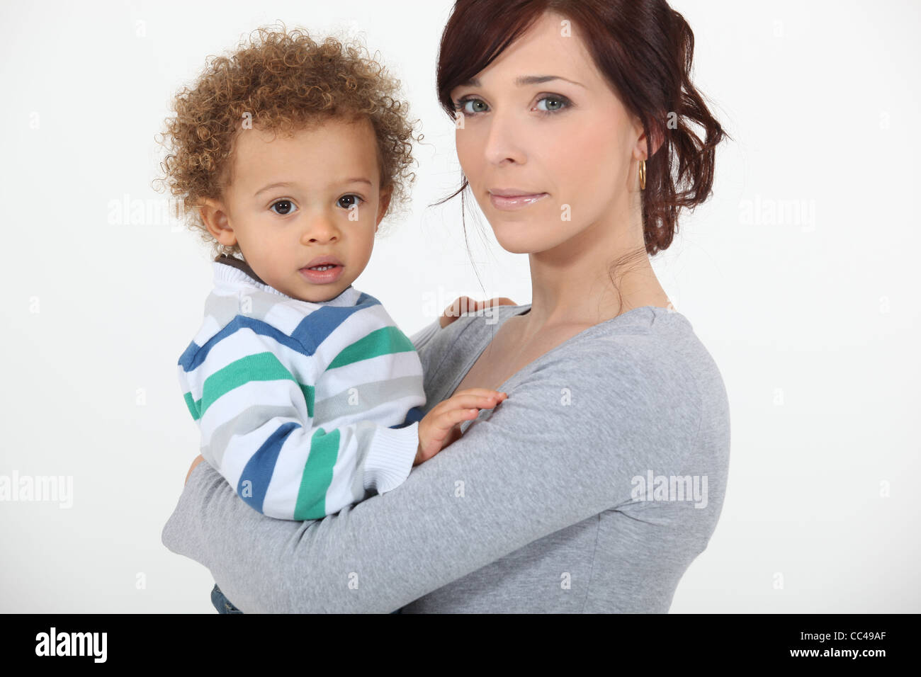 mother holding her son Stock Photo - Alamy