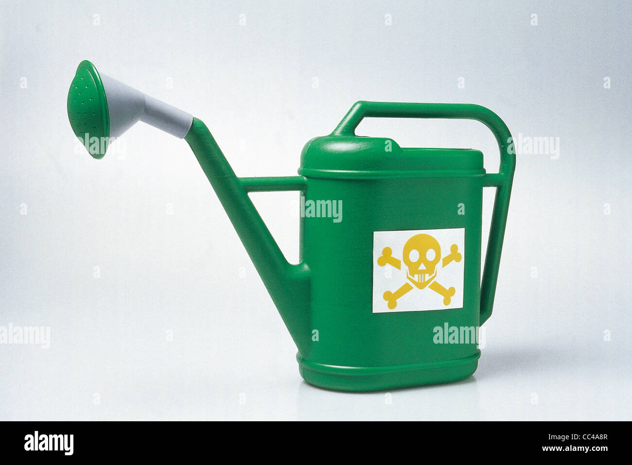 Gardening: Watering With Poison Symbol Stock Photo - Alamy