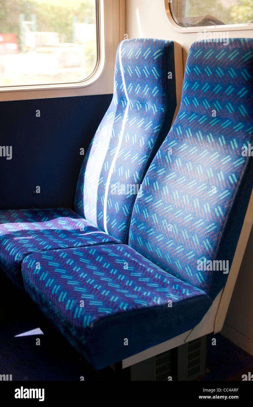 Seats on a train in Britain Stock Photo - Alamy