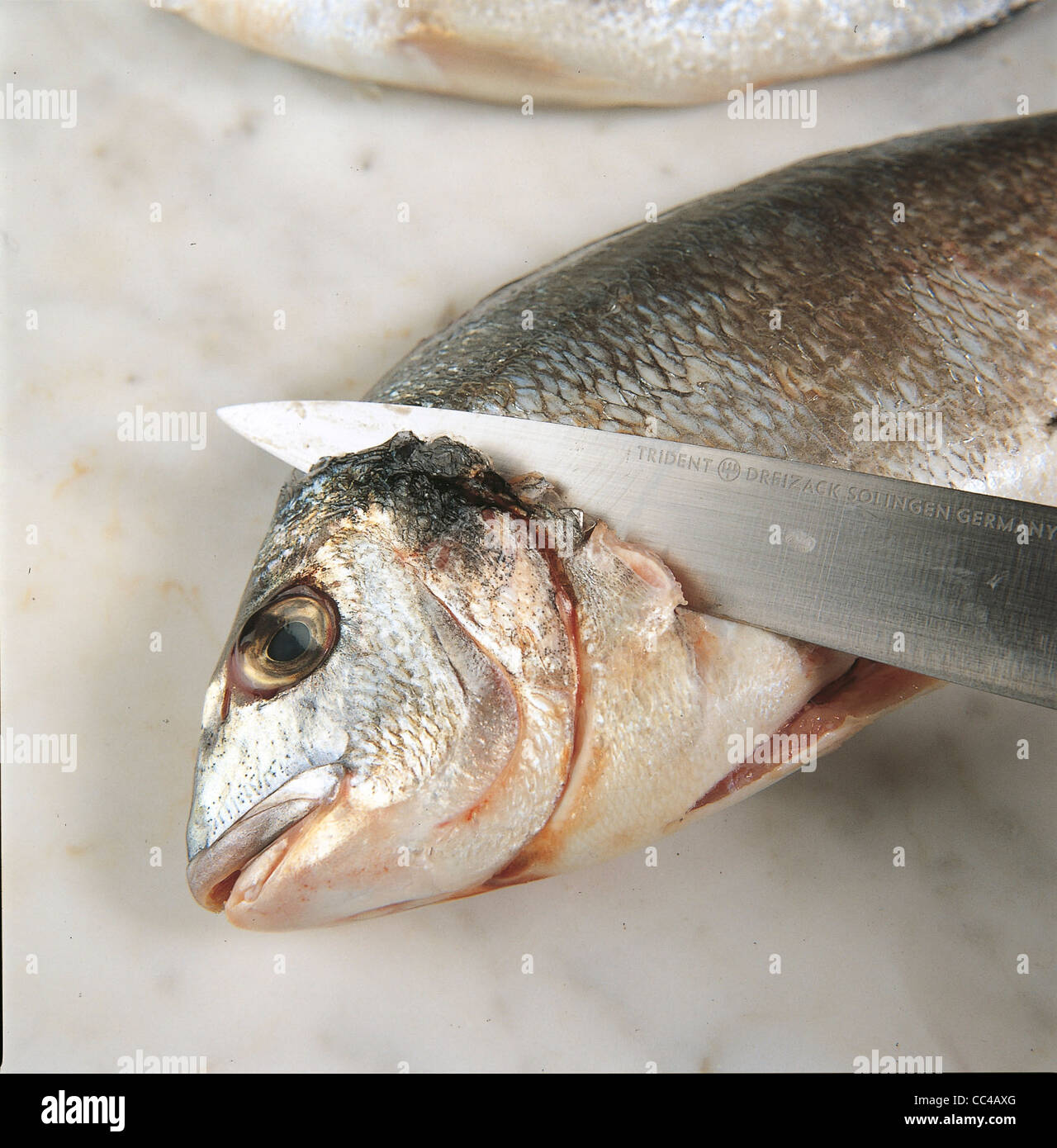 Cuisine: How To Fillet Sea Bream (4 Stock Photo - Alamy