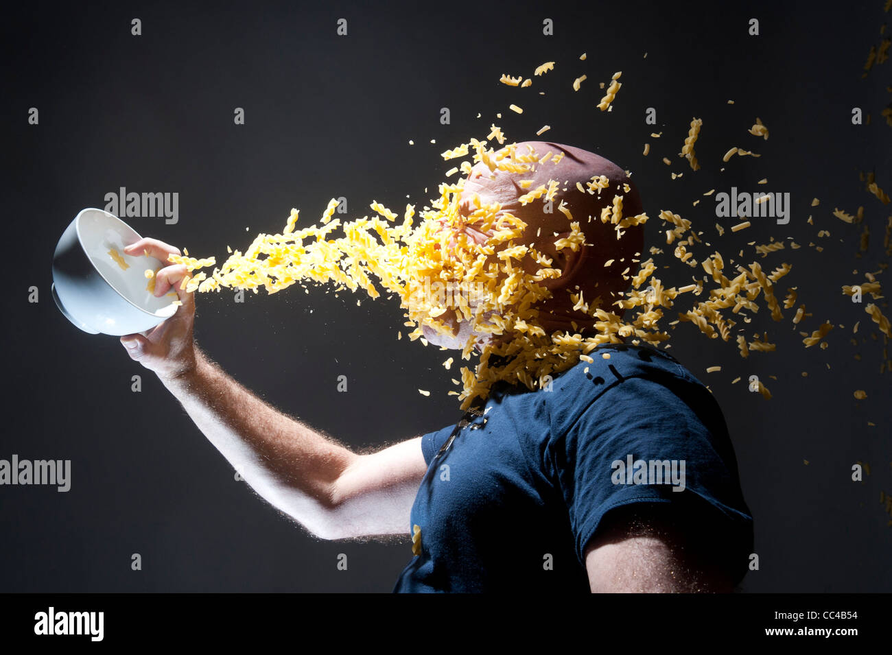 Glutton greedy eating hi-res stock photography and images - Alamy