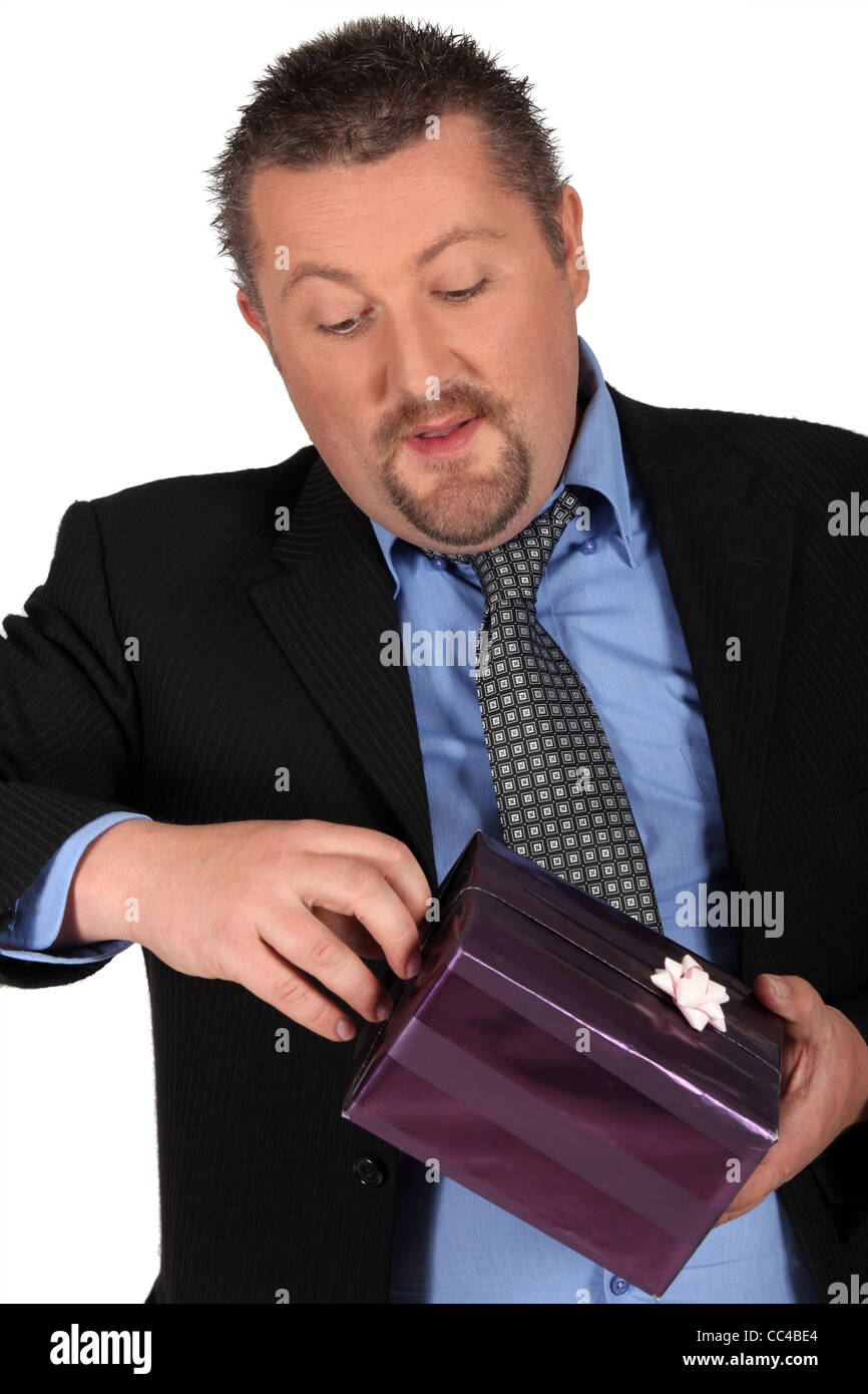 Executive giving boss gift hi-res stock photography and images - Alamy