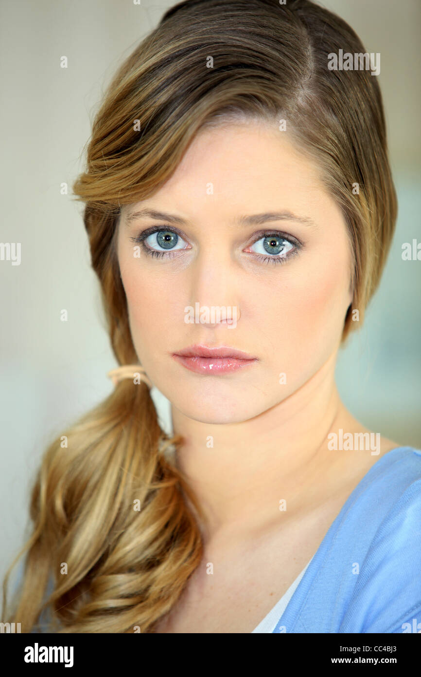 Portrait of a serious woman Stock Photo - Alamy