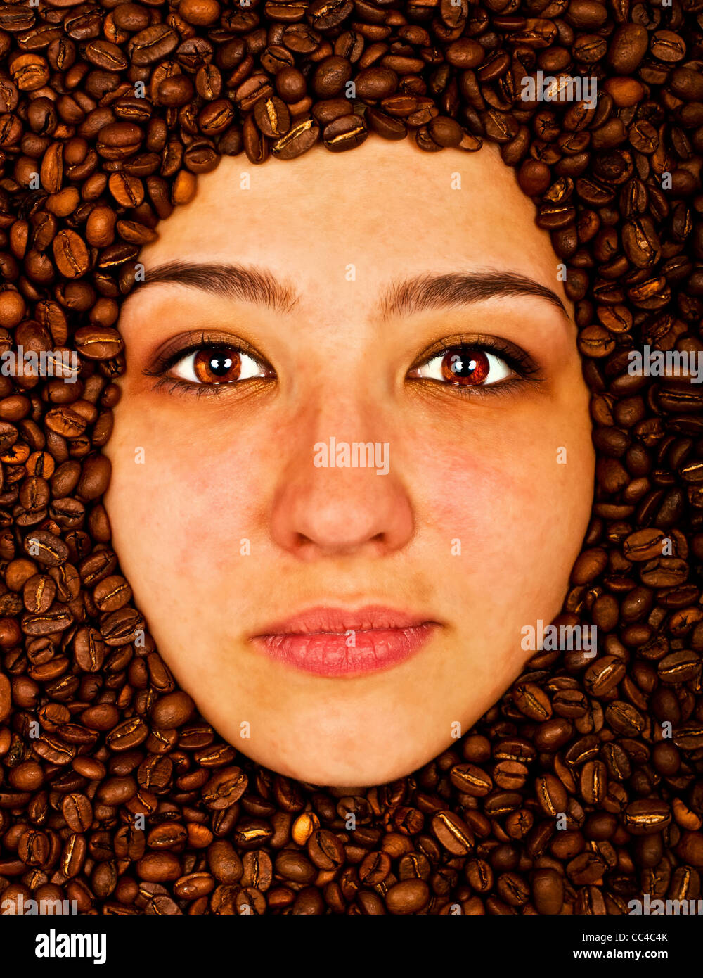 Coffee beans around of face beautiful young woman Stock Photo - Alamy